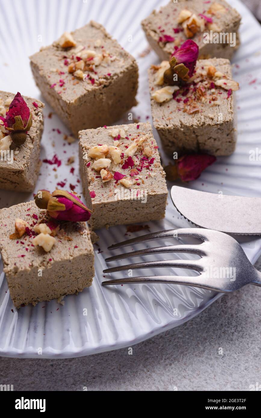 Halva with rose petal and nuts Stock Photo - Alamy