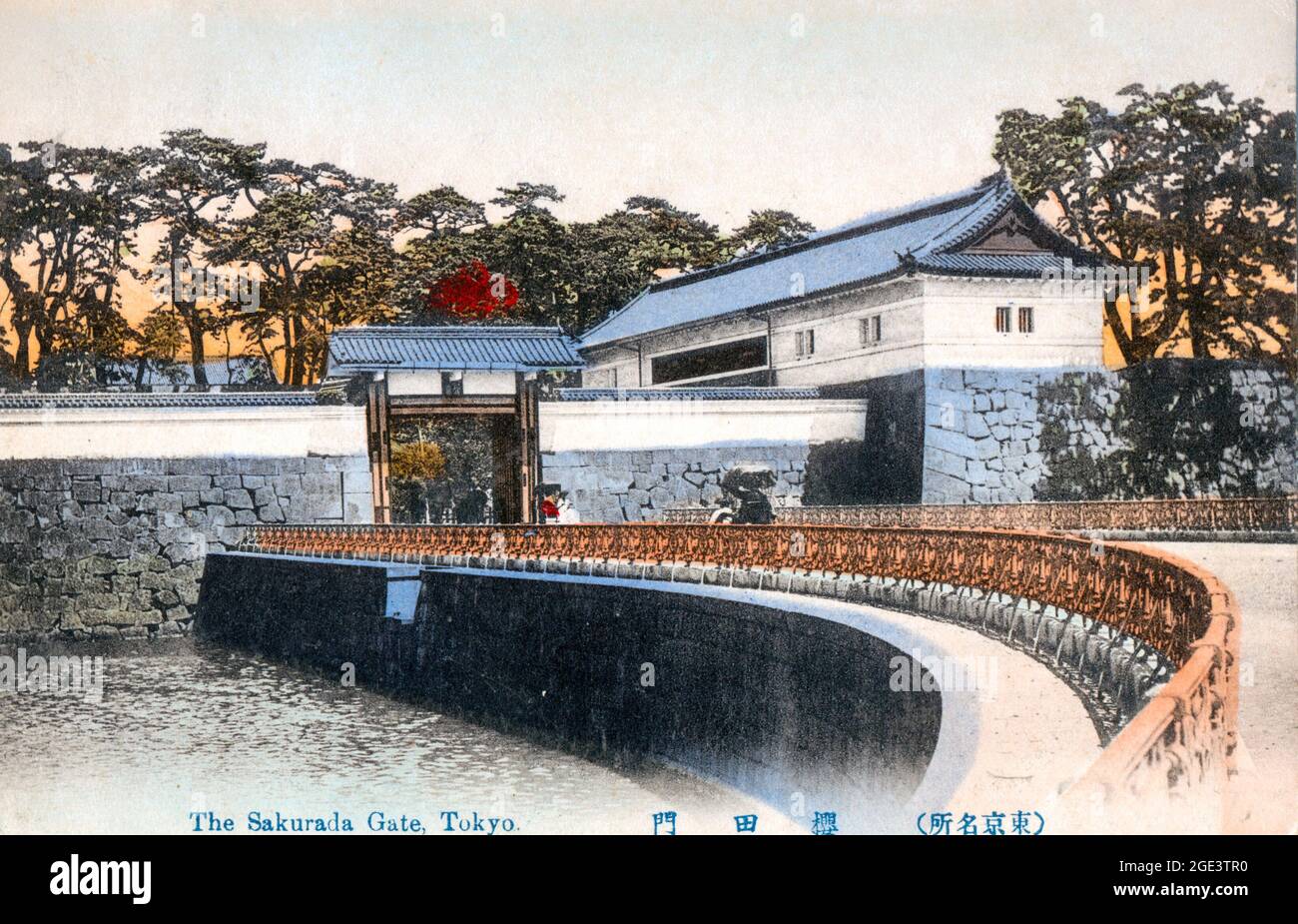 Old Japanese hand colored postcard of the Sakurada Gate, a typical ...