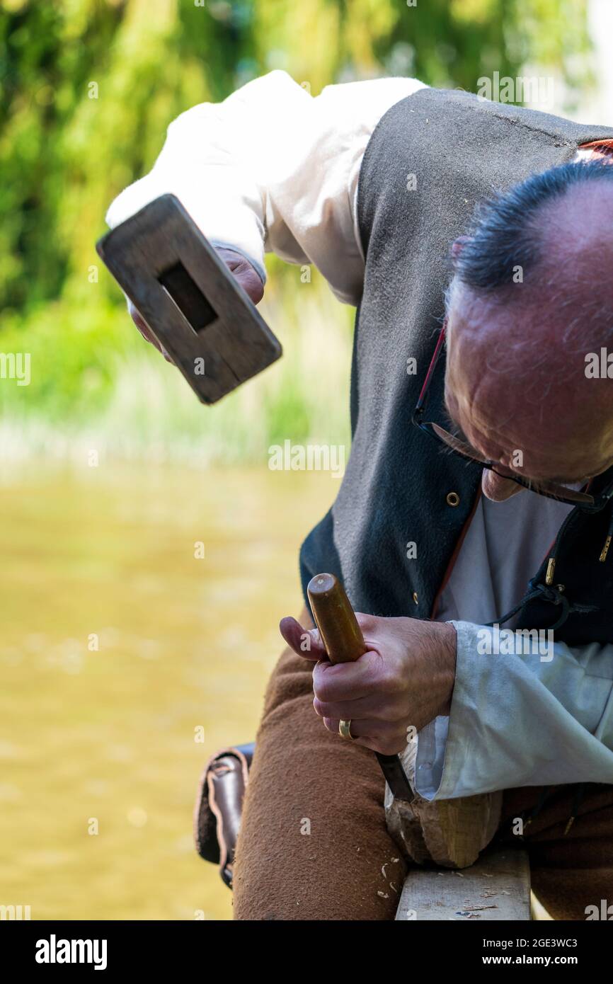 Close up of a senior man, Medieval carpenter living history reenactor ...