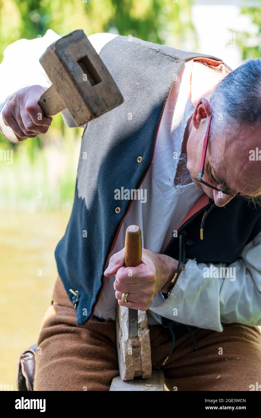 Close up of a senior man, Medieval carpenter living history reenactor ...