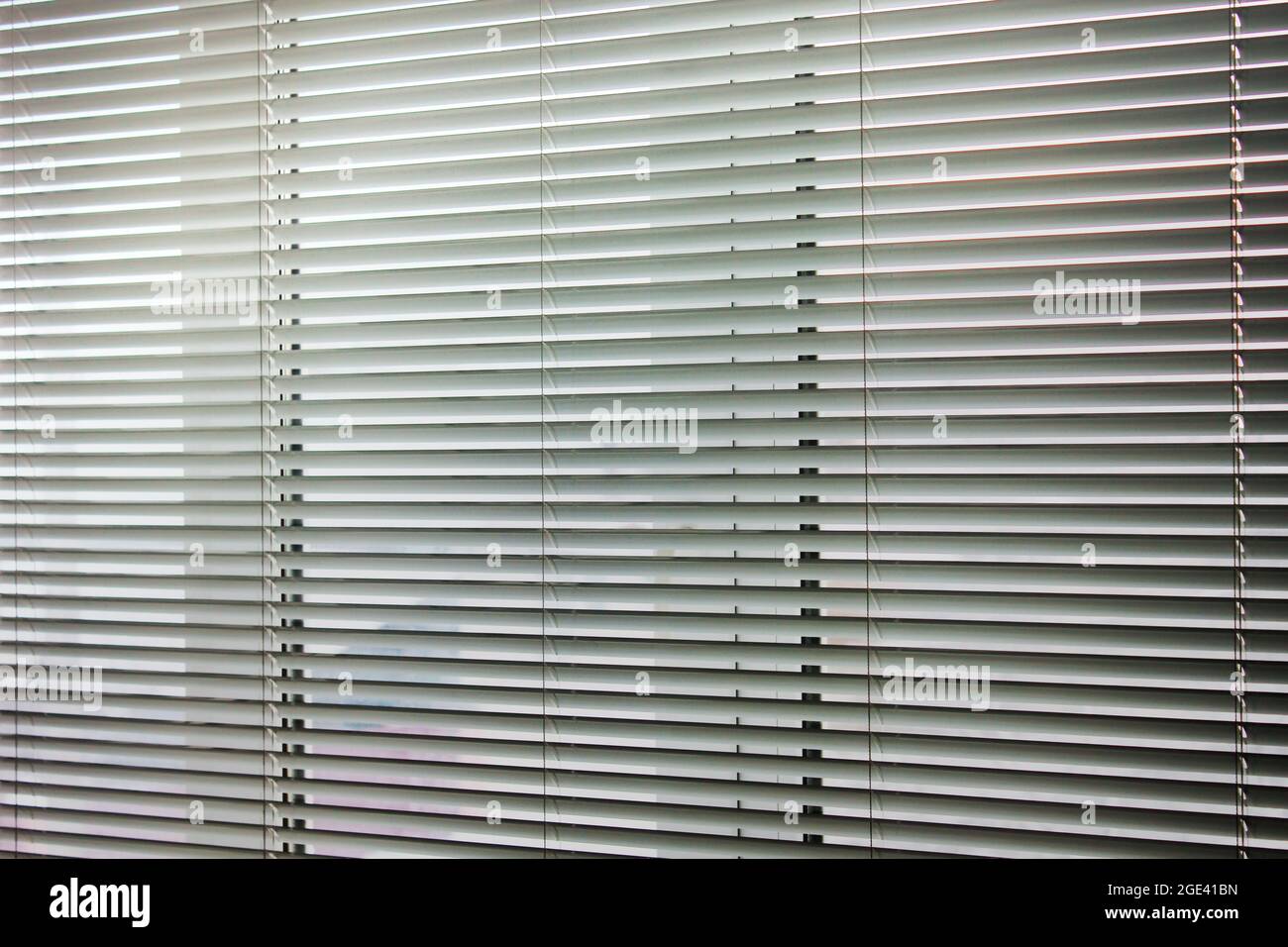Blinds on the window. Ajar window Stock Photo - Alamy
