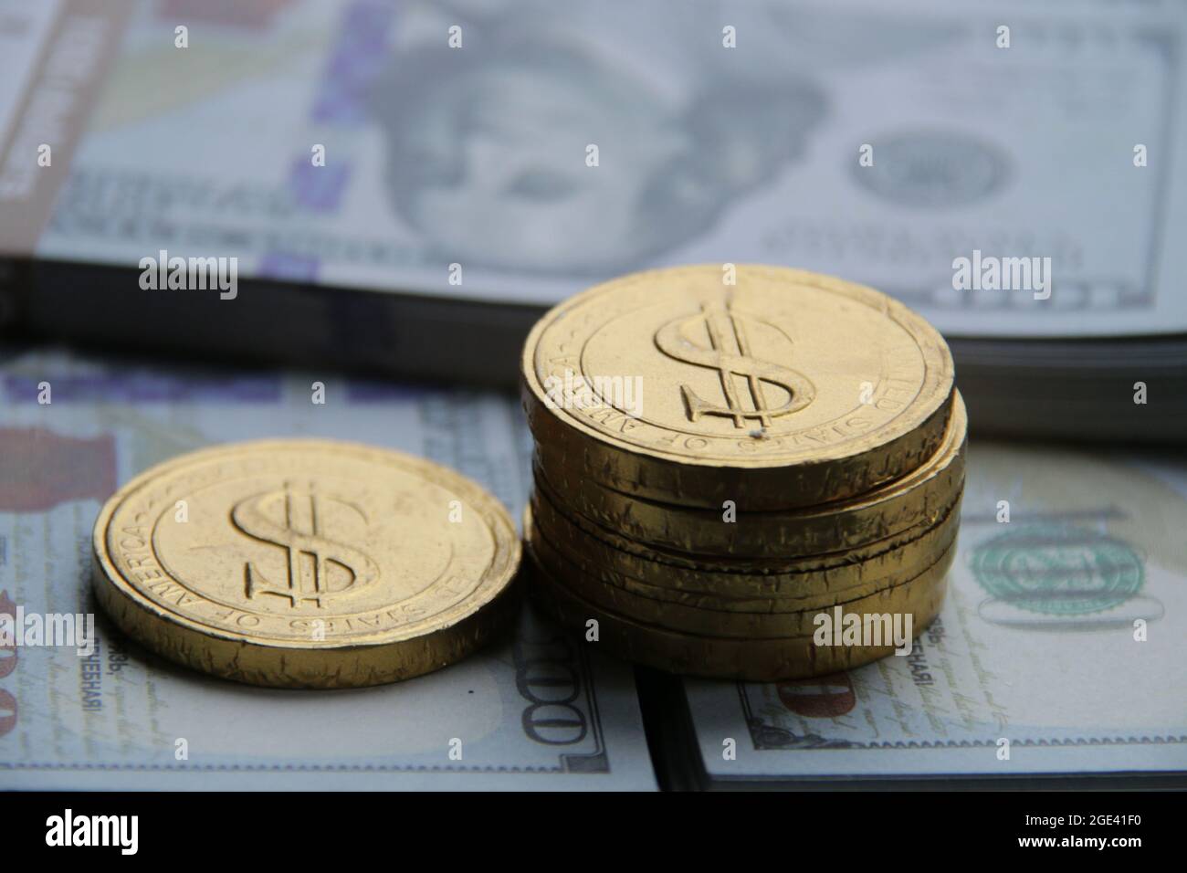 Financial background. Income growth concept. Gold coins and dollars ...