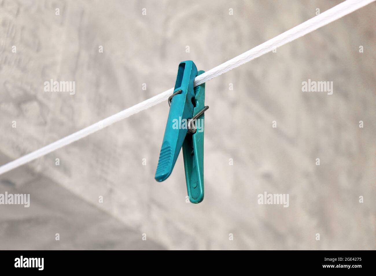 Four wooden clothespin hi-res stock photography and images - Alamy