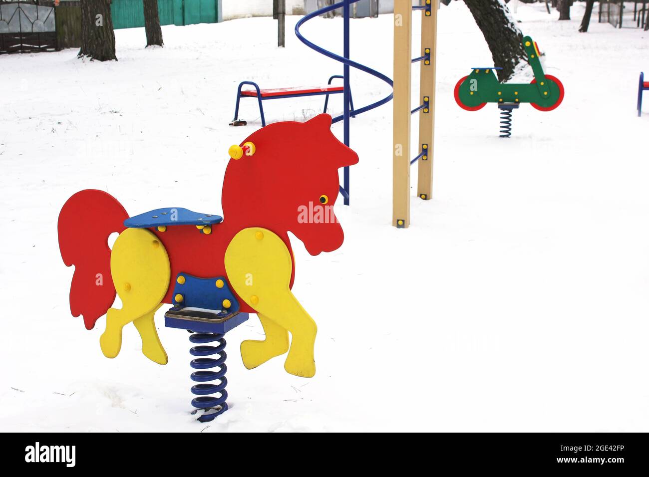 Children's swing. Winter. Playground. Children's playground is empty in ...
