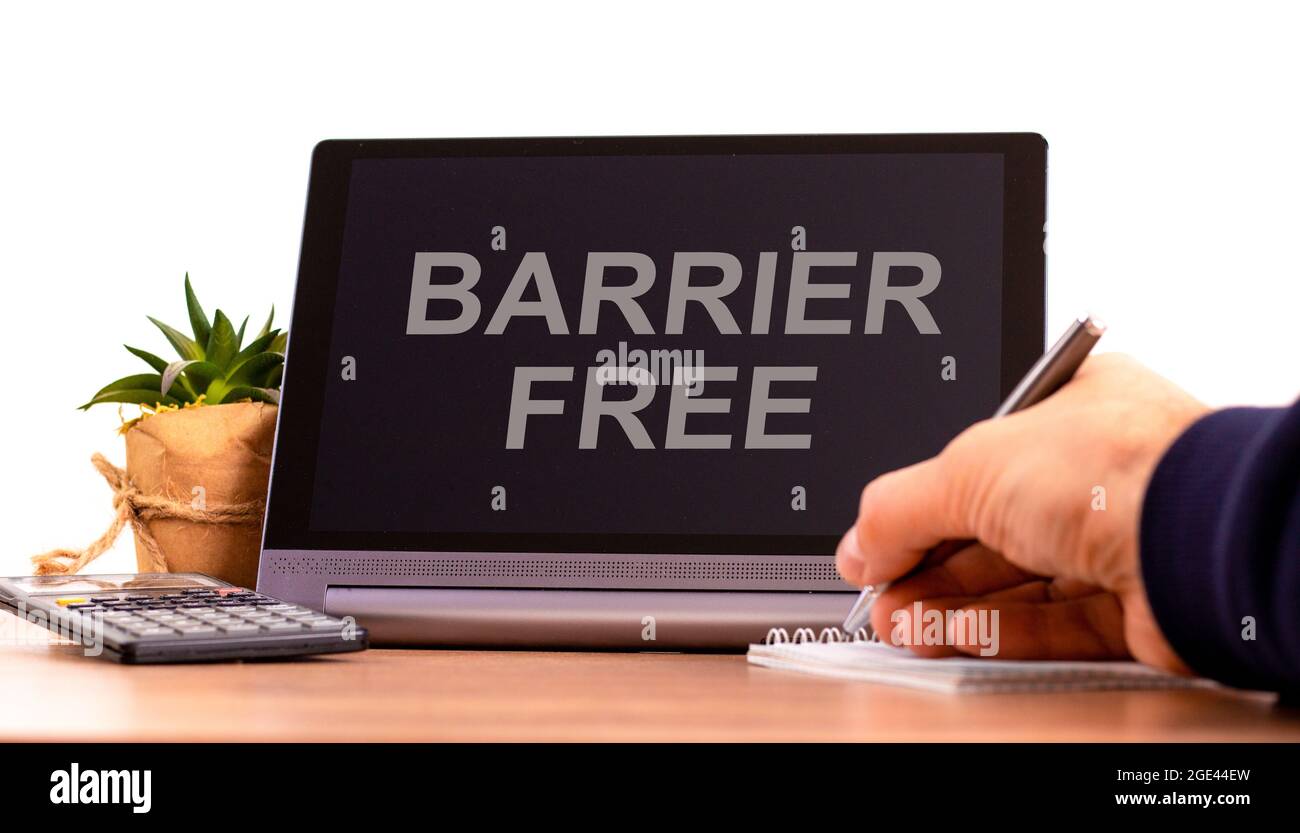 Barrier free symbol. Tablet with words 'barrier free'. Businessman hand ...