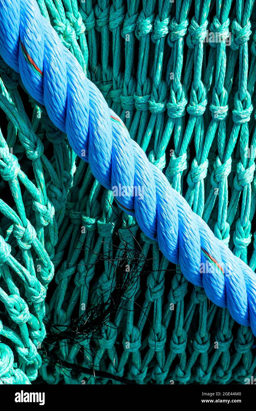 Fishnet and rope, Saint-Vaast la Hougue fishing harbor, Manche ...