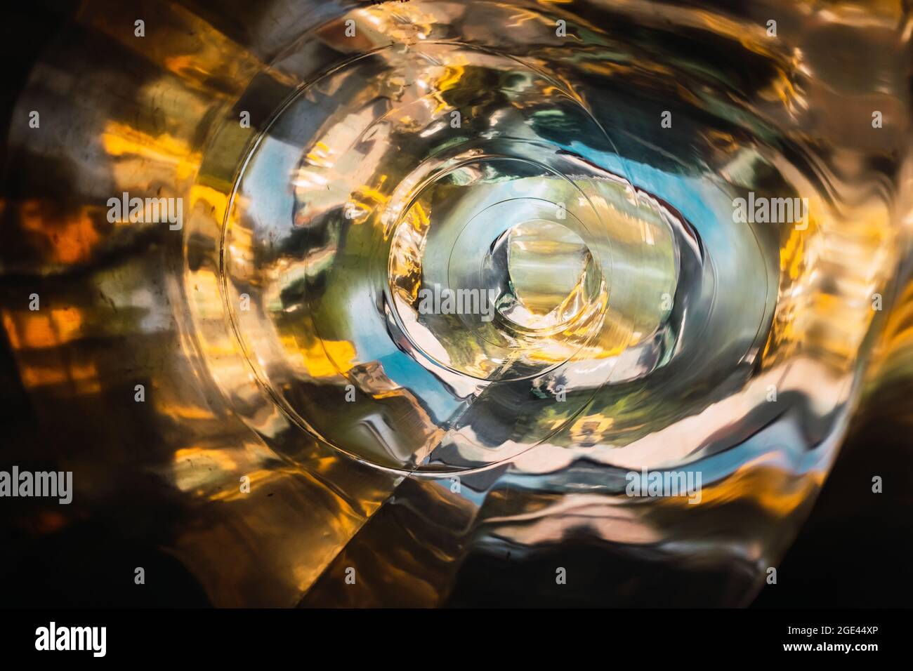 Abstract tube shape background with converging metallic reflections ...