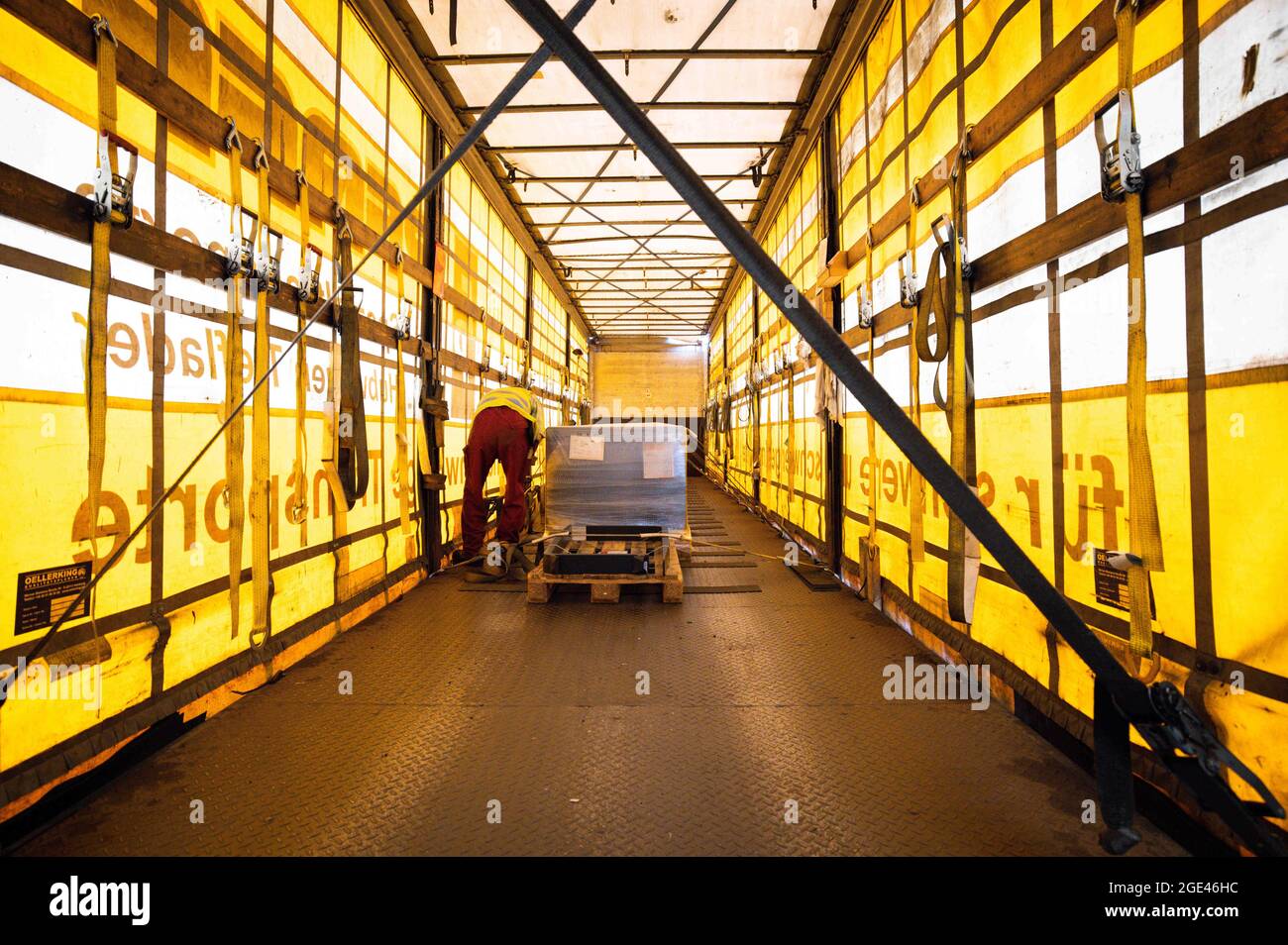 Hamburg, Germany. 04th Aug, 2021. A driver checks the securing of his ...