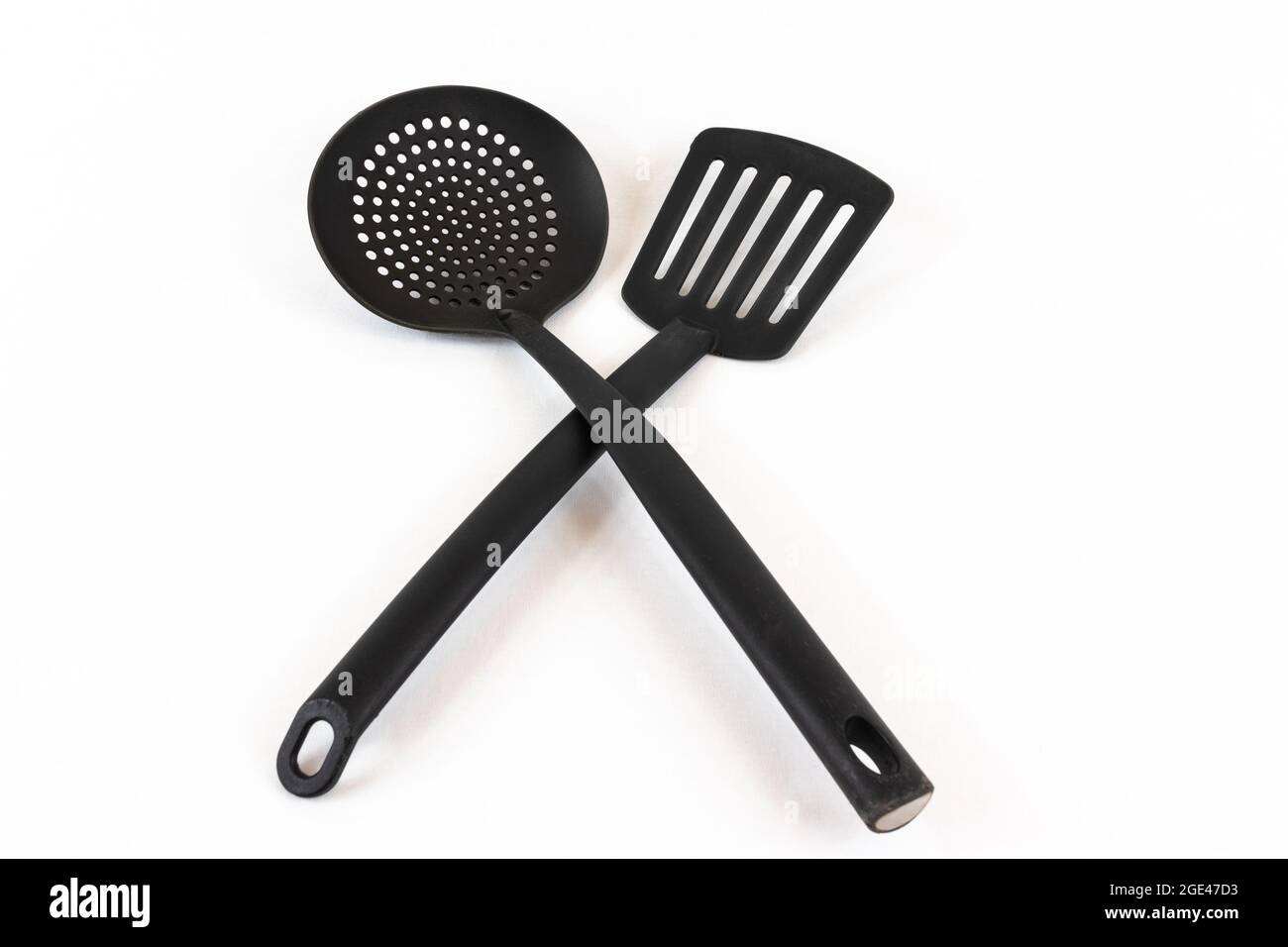 Plastic cooking vane and isolated on a white background Stock Photo - Alamy
