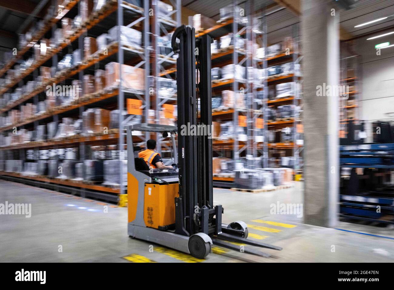 Hamburg, Germany. 04th Aug, 2021. A man works with a forklift between ...