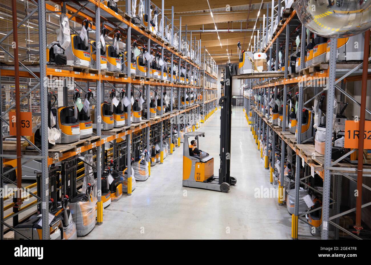 Hamburg, Germany. 04th Aug, 2021. A man works with a forklift between ...