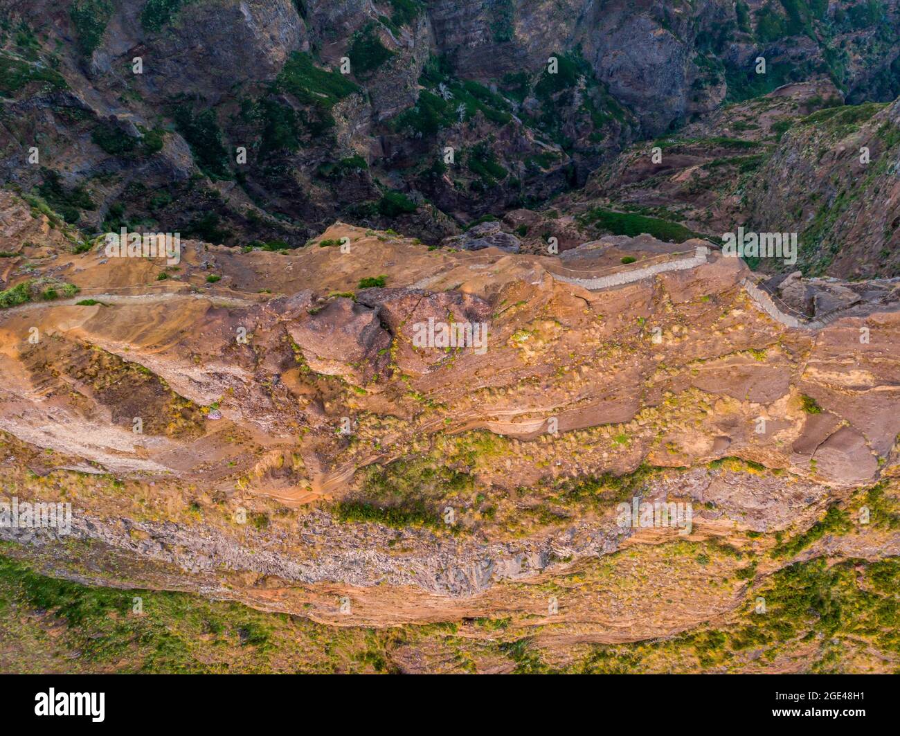 Drop down view of trail following volcanic mountain ridge Stock Photo ...