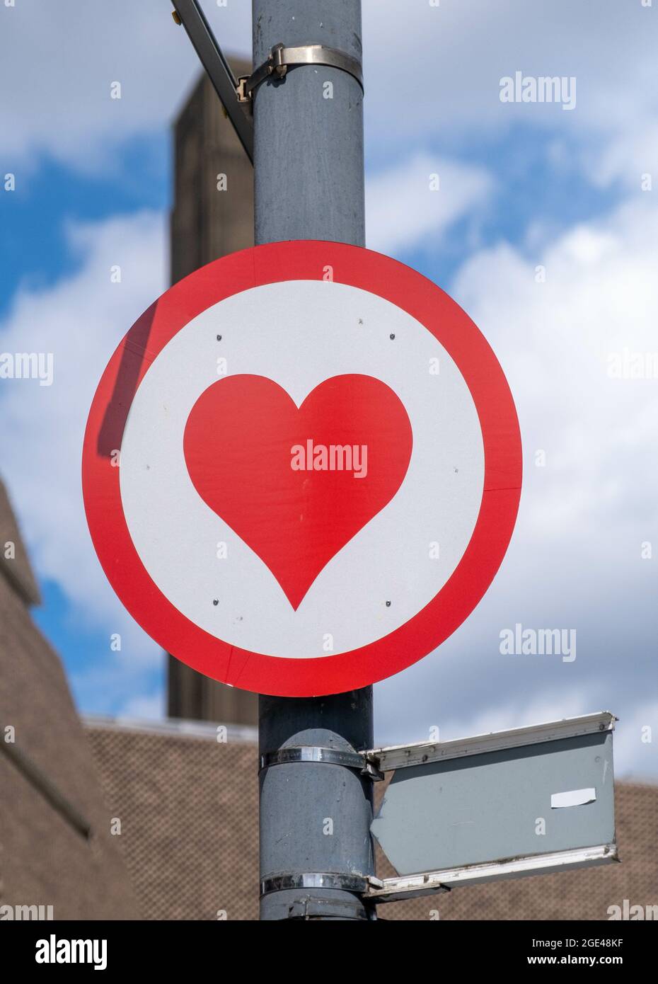 LONDON, UNITED KINGDOM - Jul 30, 2021: A heart road sign behind Tate ...