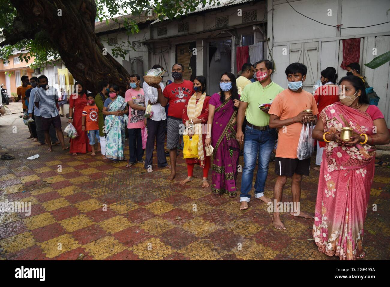 August 16, 2021, Guwahati, Guwahati, India: Hindu devotees queue to ...