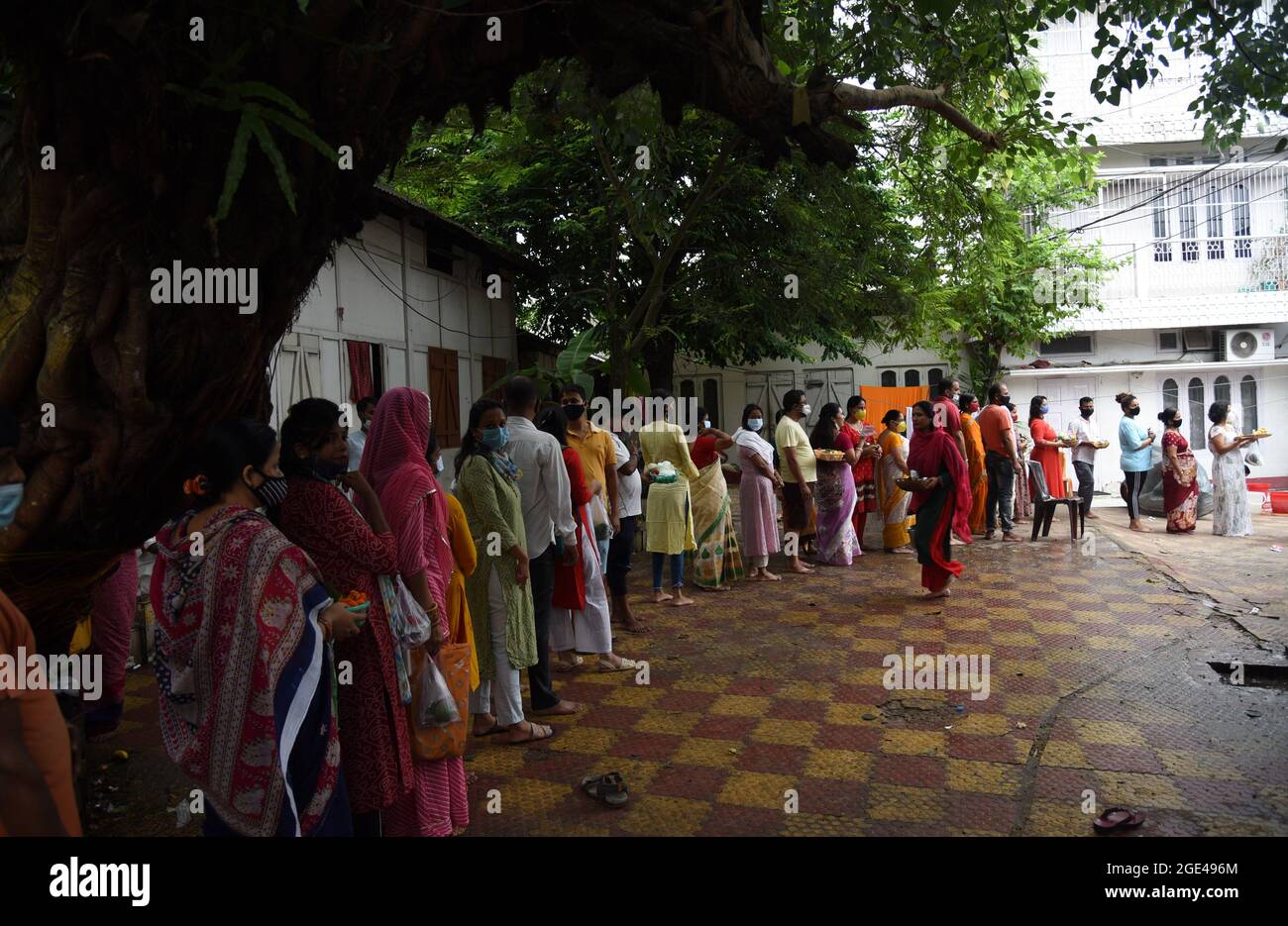 August 16, 2021, Guwahati, Guwahati, India: Hindu devotees queue to ...