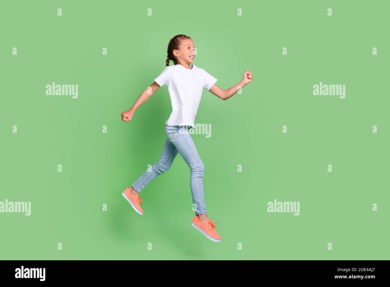 Full length body size photo little girl jumping up running fast ...