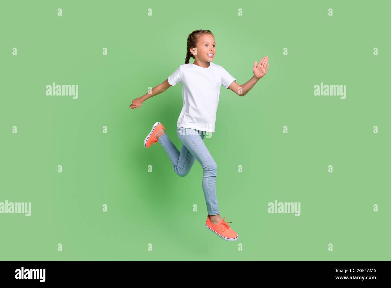 Full length body size photo little girl jumping high running fast ...