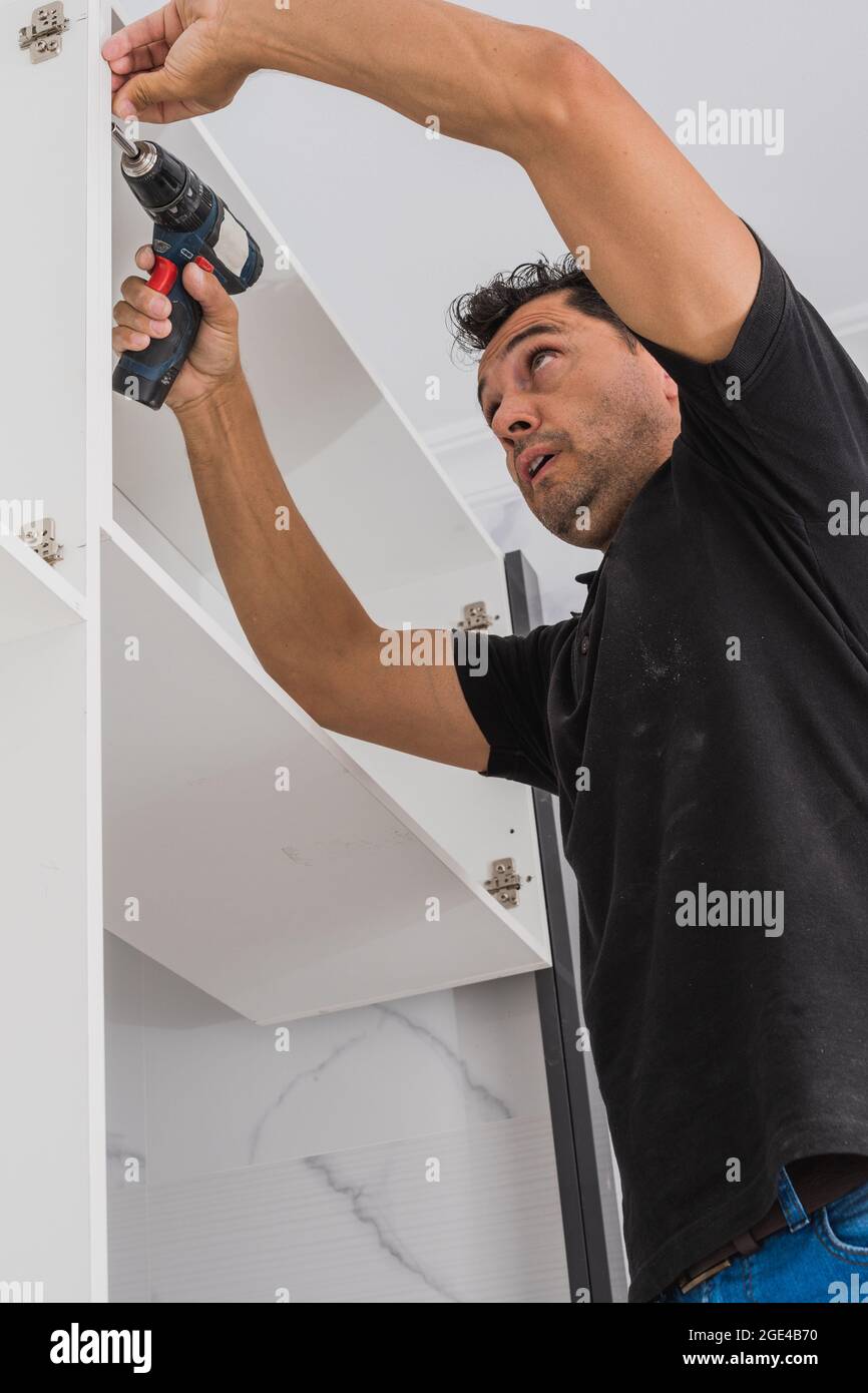 Man With A Drill High Resolution Stock Photography and Images - Alamy
