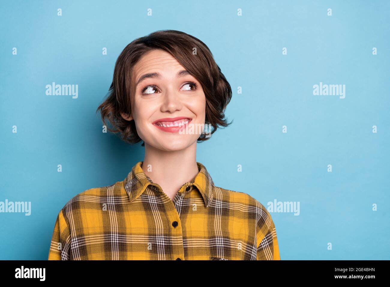 Photo of charming positive girl look empty space imagine ideas wear ...