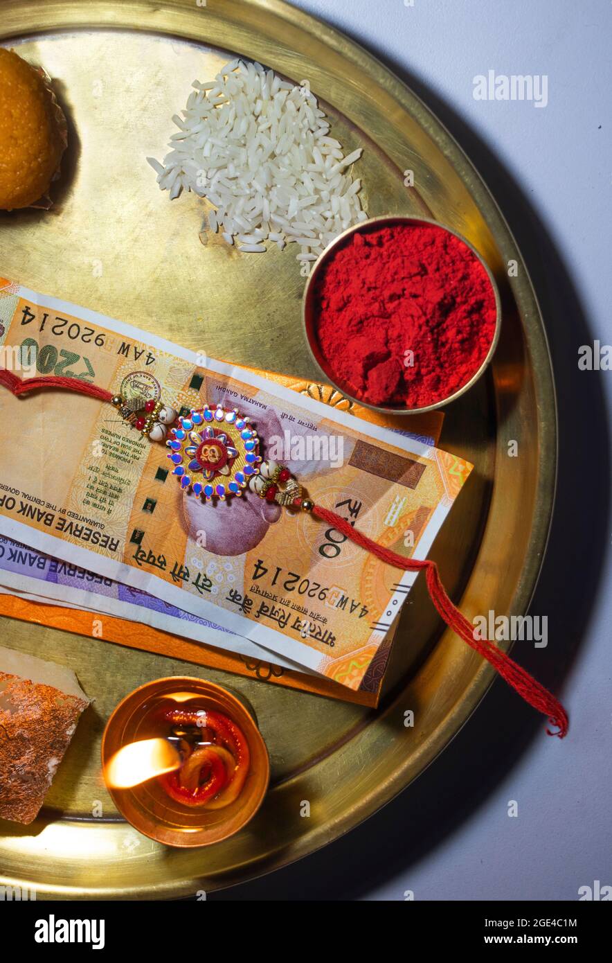 Close-up Rakhi kept in a decorative thali on the occasion of ...