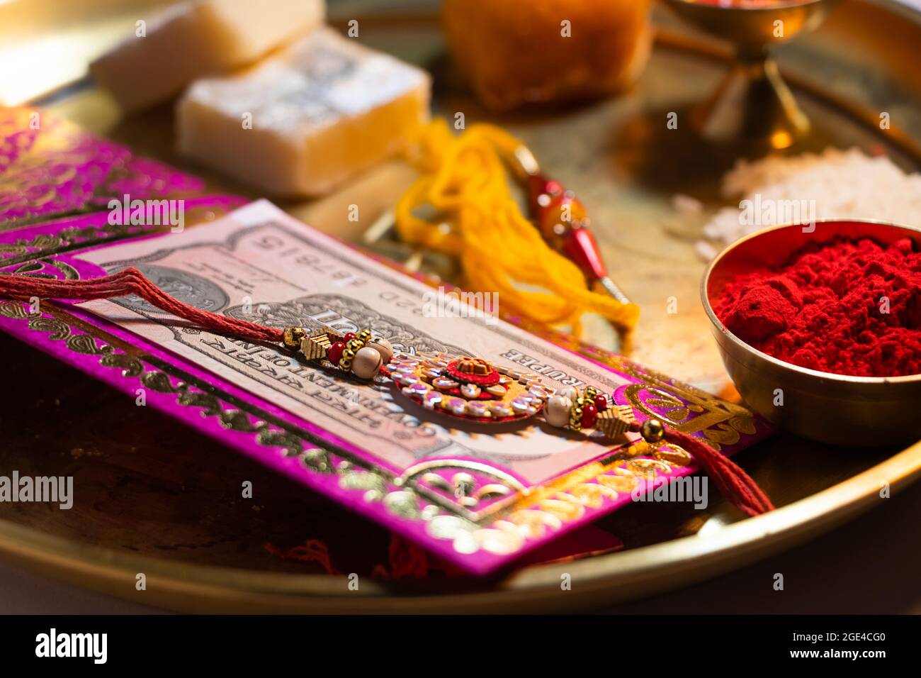 Close-up Rakhi kept in a decorative thali on the occasion of ...