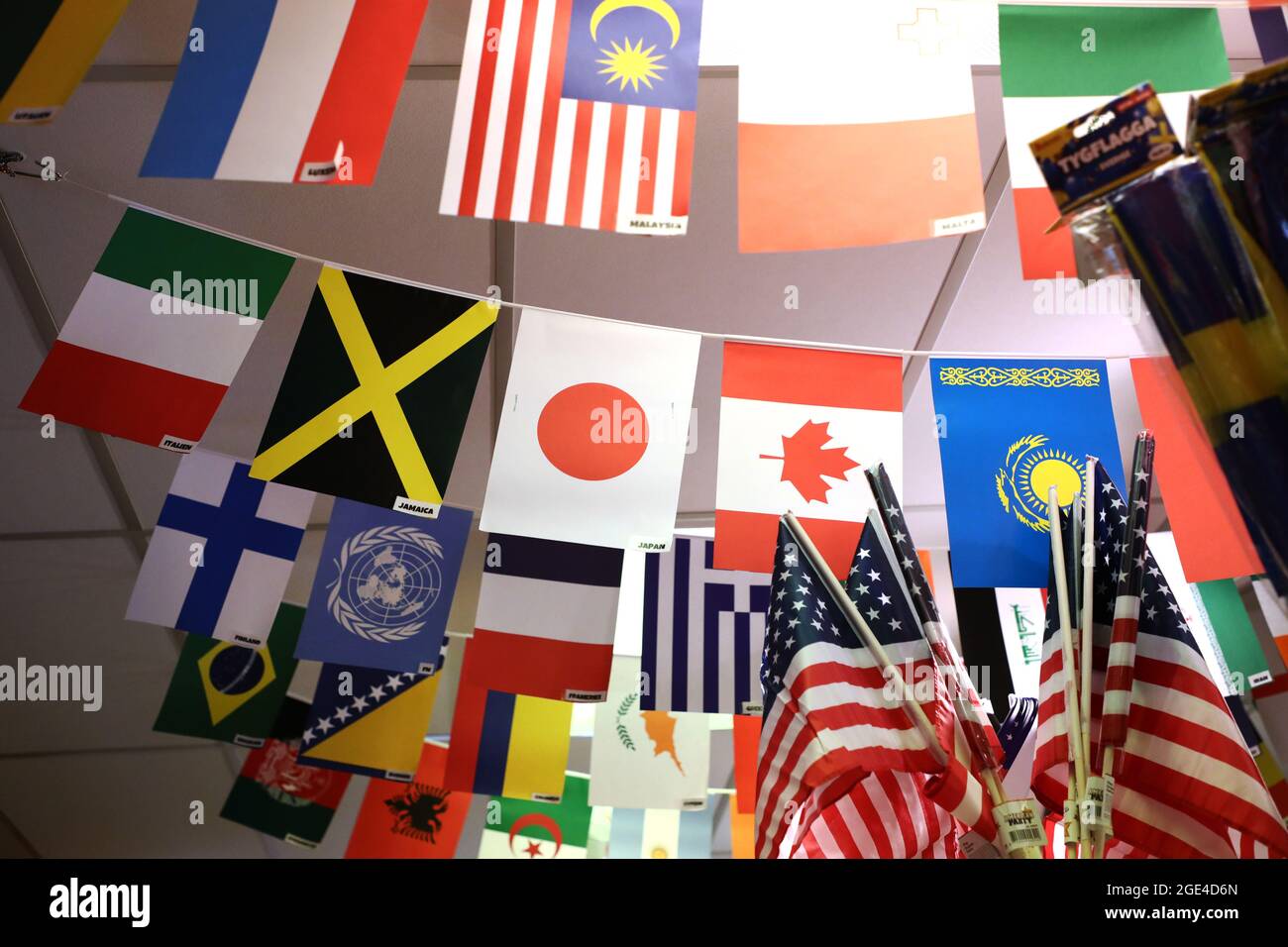 Different national flags in a store Stock Photo - Alamy