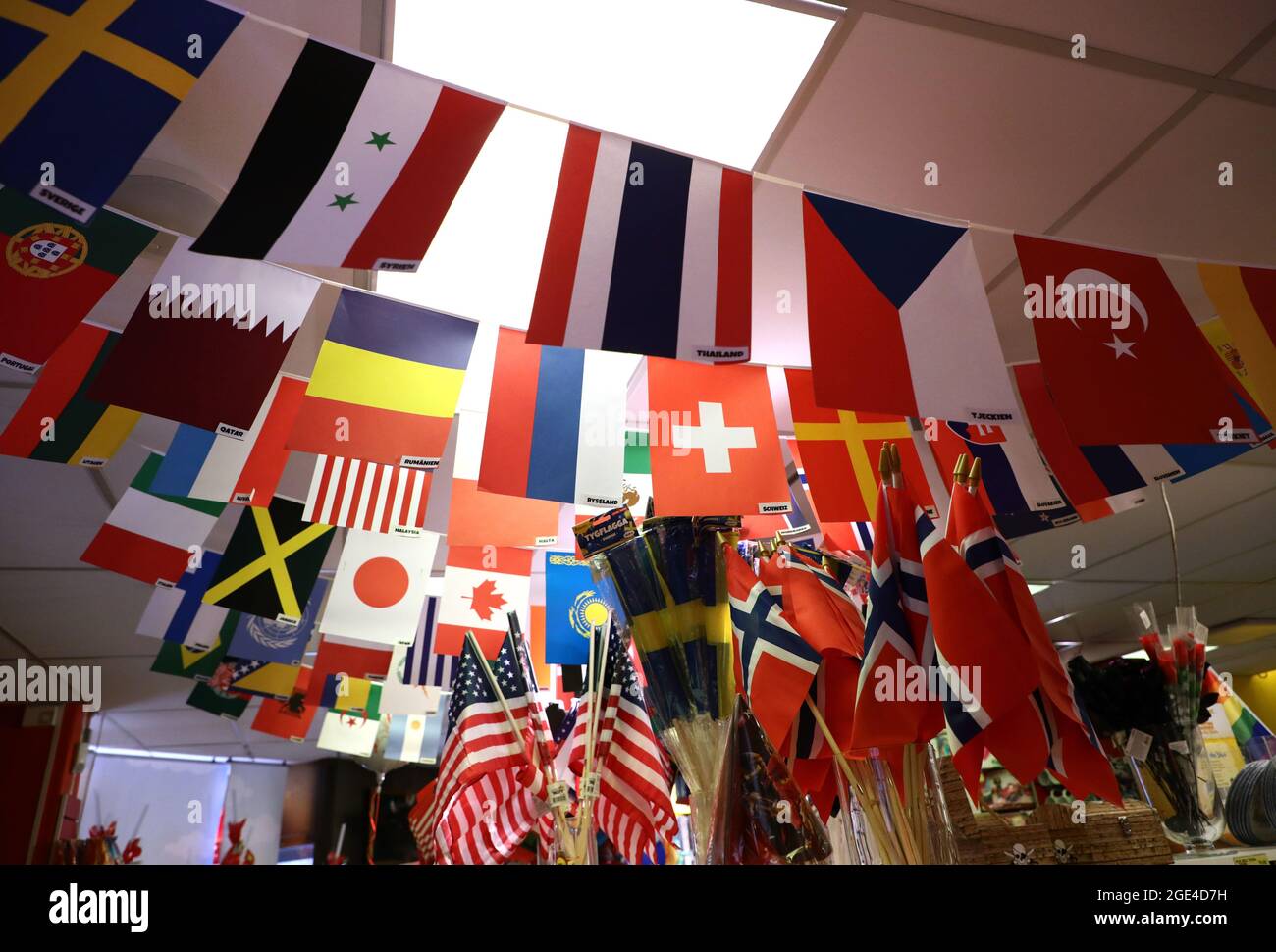 Different national flags in a store Stock Photo - Alamy