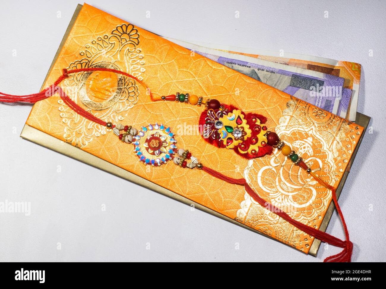 Rakhi kept on a gifitng envelope Stock Photo - Alamy
