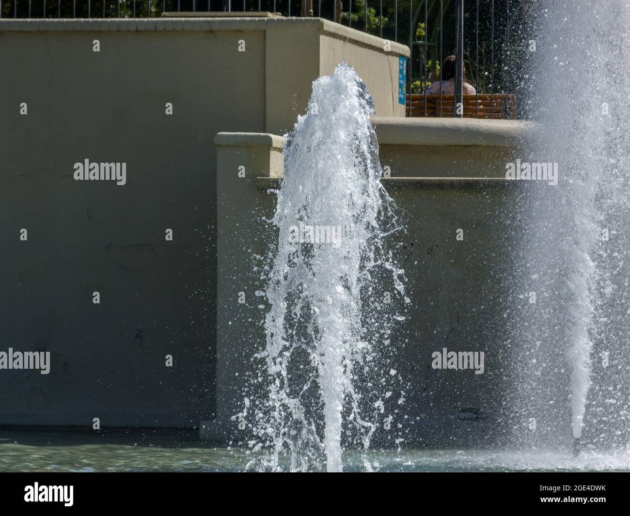 Water flowing in the fountain of a park Stock Photo - Alamy