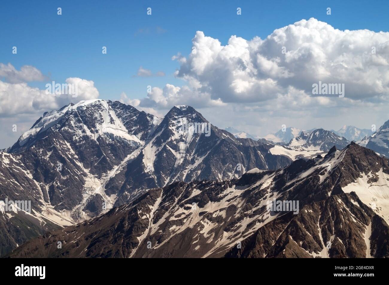 Beautiful landscape with the Caucasus mountains. Snow-capped peaks of the mountains from a ...
