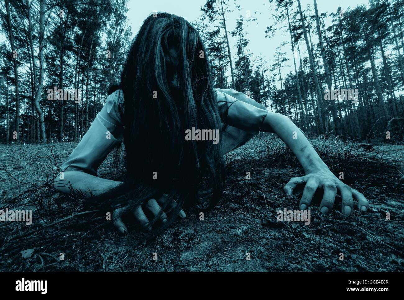 Girl with long black hair in image of scary ghost zombie crawls on ...