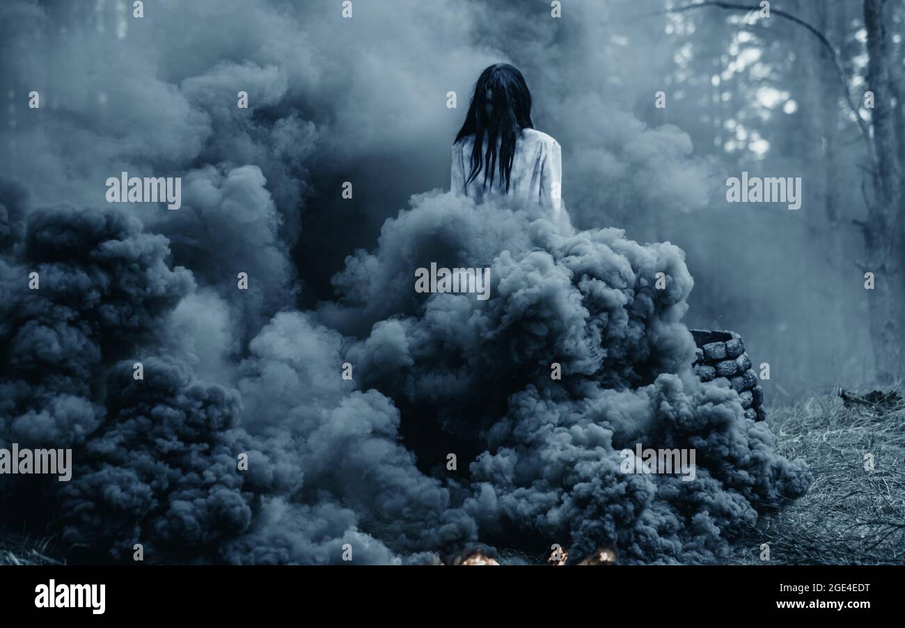 Girl with long black hair in image of scary ghost zombie walks among ...