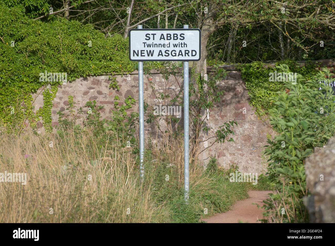 Joke twin town sign hi-res stock photography and images - Alamy