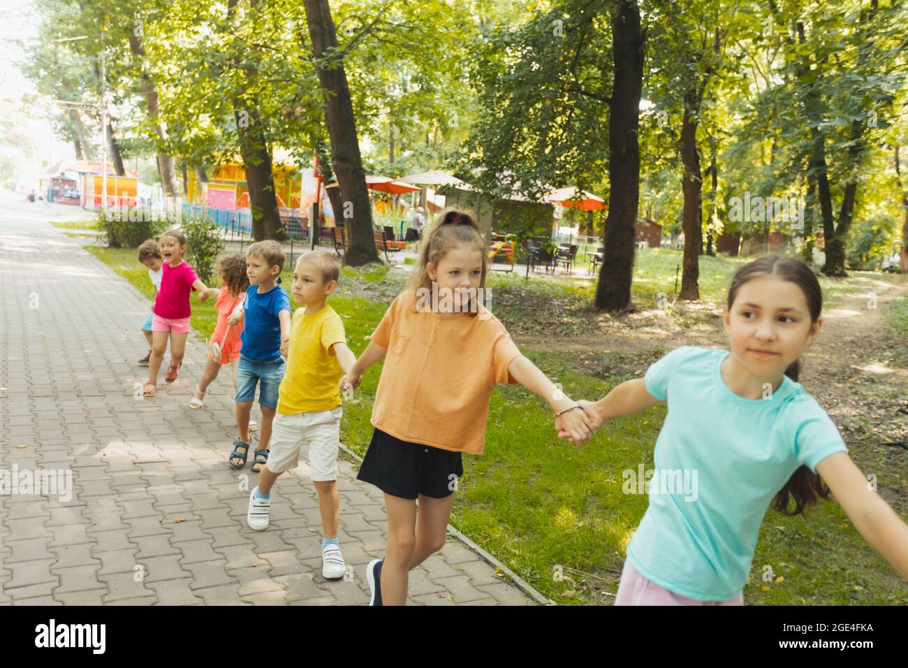 Lovely children playing outdoors at summer camp Stock Photo - Alamy