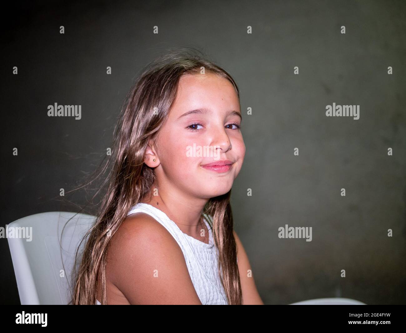 Portrait of a pretty smiling Spanish girl Stock Photo - Alamy