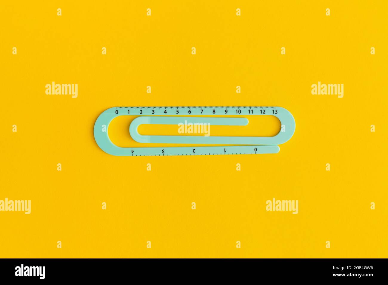 School blue ruler on yellow background. Top view with copy space. Flat ...