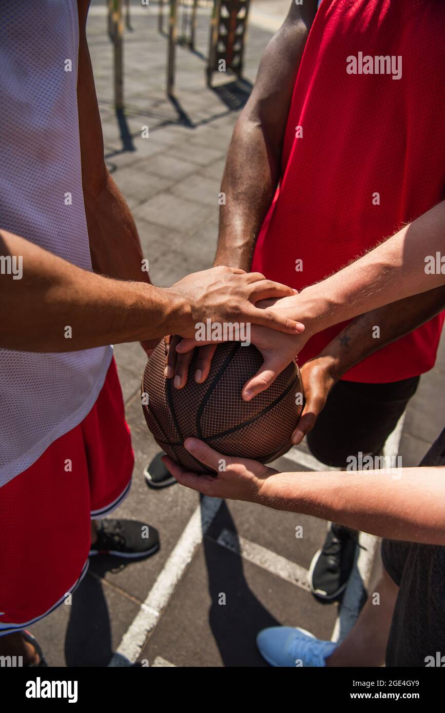 Hands holding basketball african american hi-res stock photography and ...