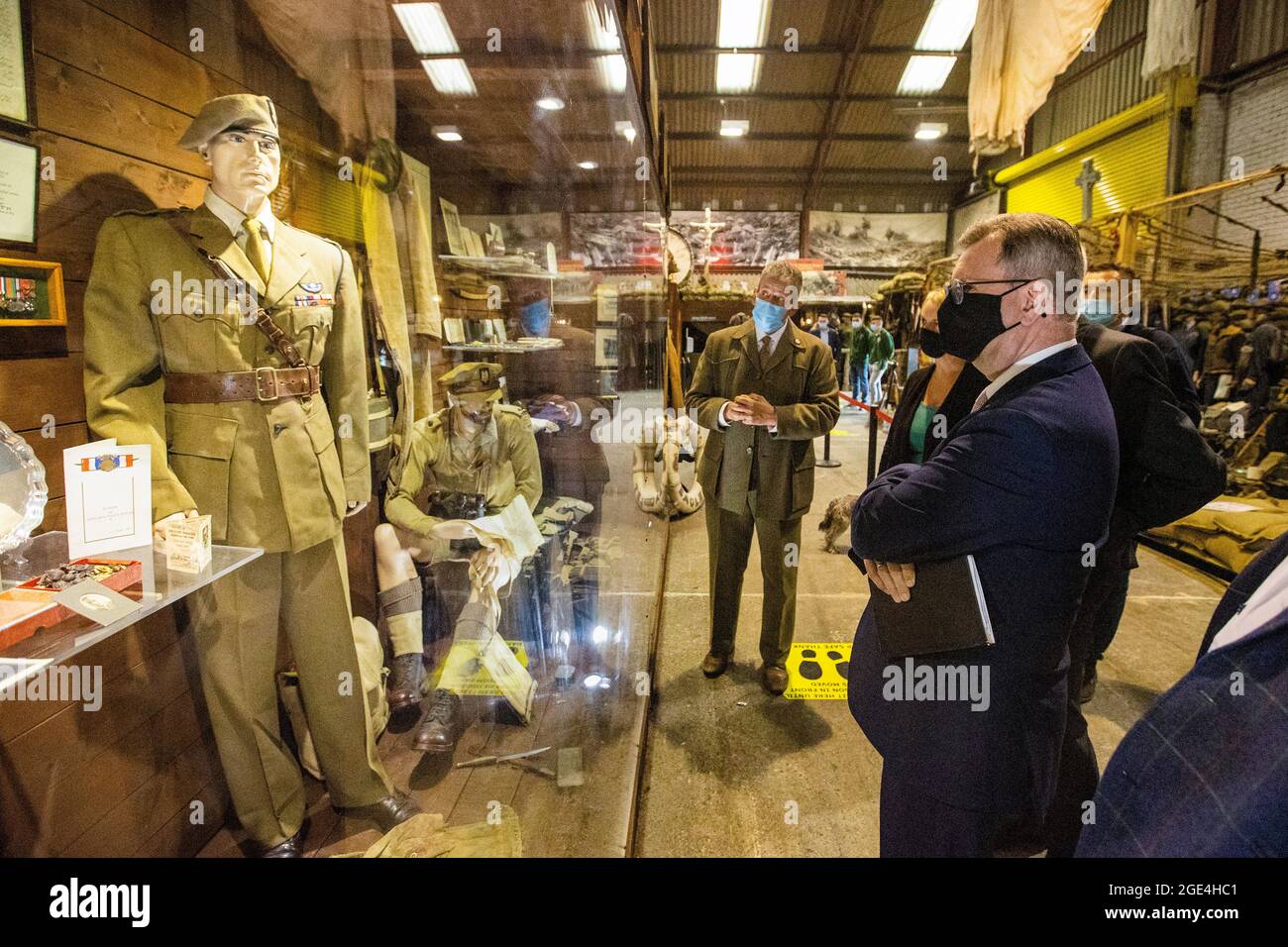 Leader of the DUP Sir Jeffrey Mark Donaldson MP (left) looks at ...