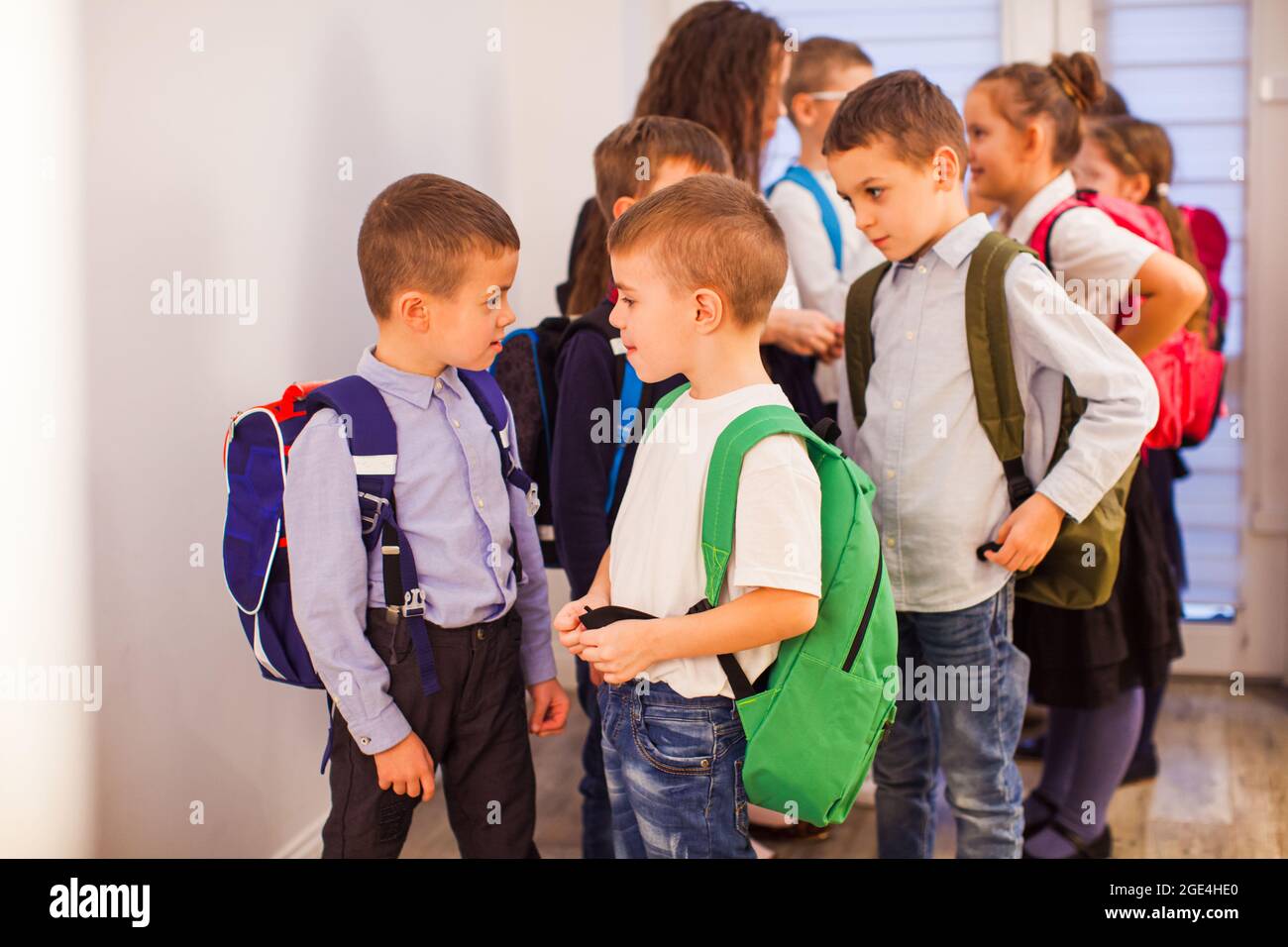 Group of schoolmates going to lessons together Stock Photo - Alamy