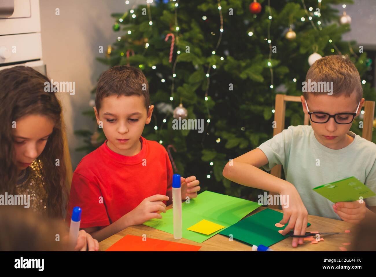 the children create a beautiful application together Stock Photo - Alamy