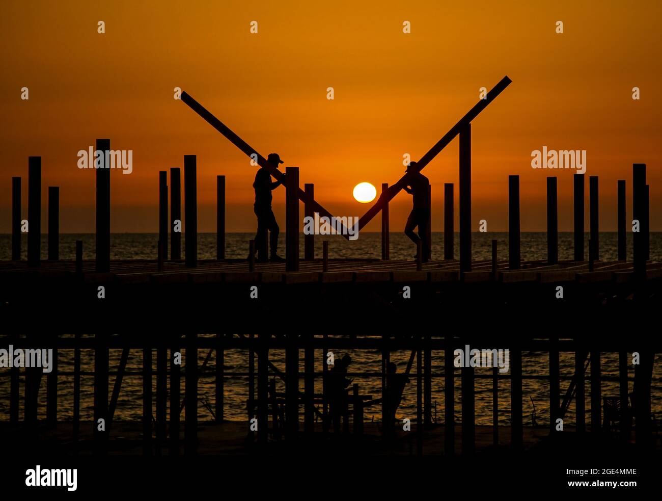 Wooden bridge two men hi-res stock photography and images - Alamy