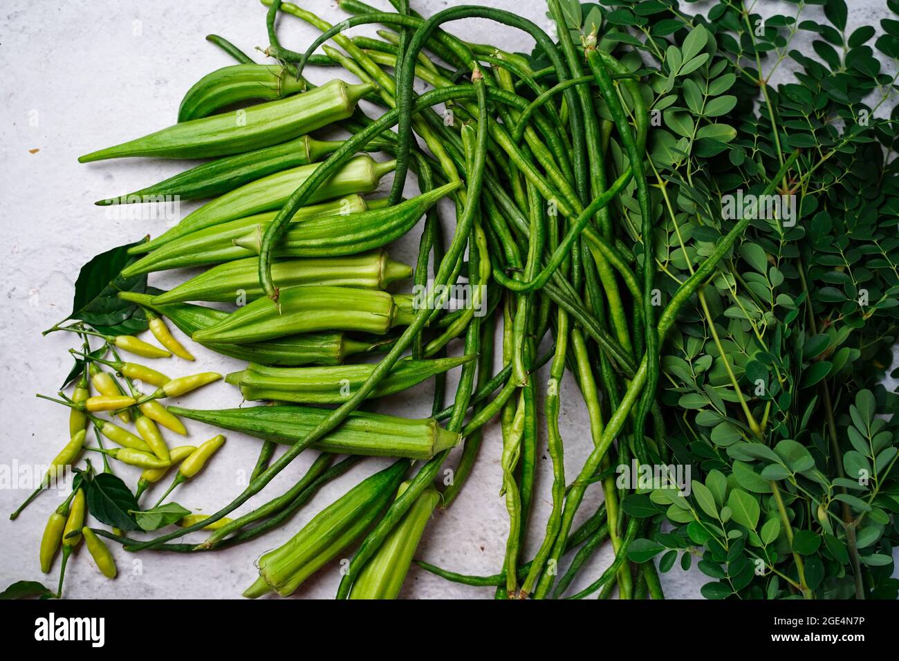 Fresh picked garden vegetables - long beans,Moringa leaves okra Stock ...