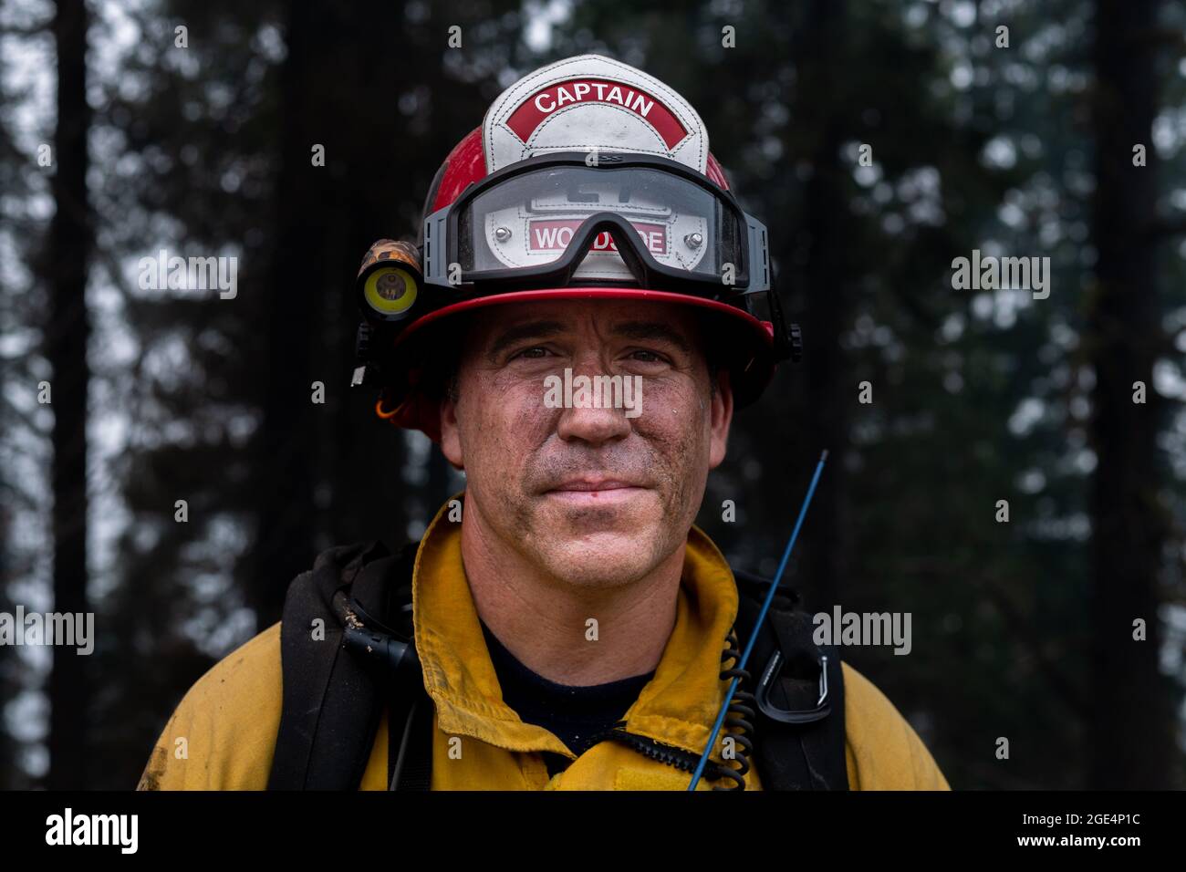 Firefighter Robert Douthit, 46, poses for a portrait while battling the ...