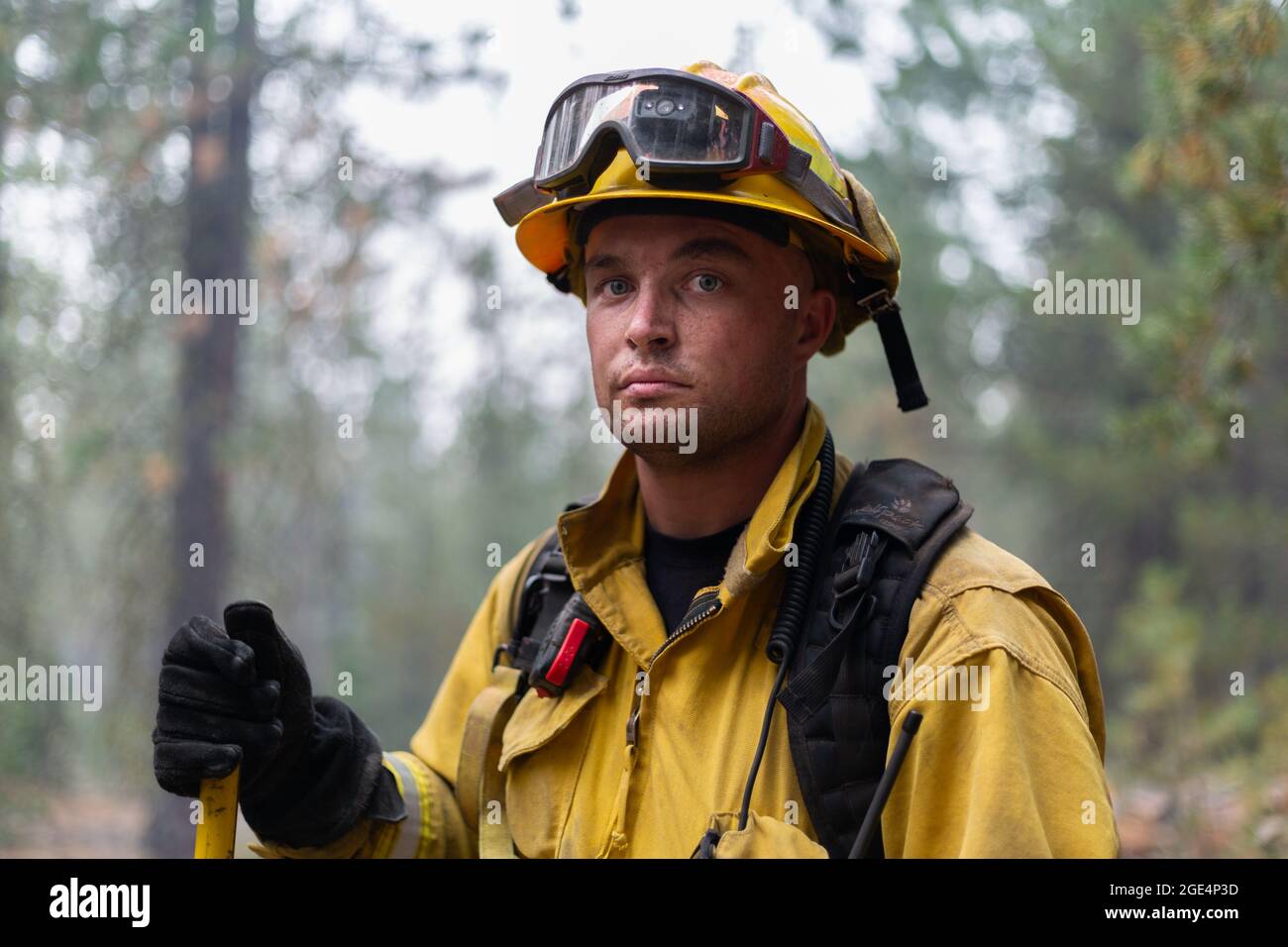 Firefighter Logan Hussey, 28, poses for a portrait while battling the ...