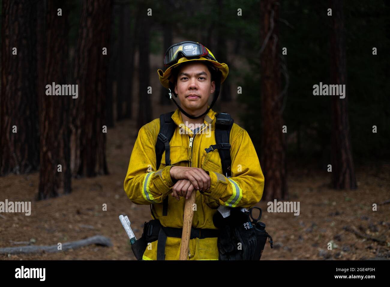 Firefighter Ryan Mock, 34, poses for a portrait while battling the ...