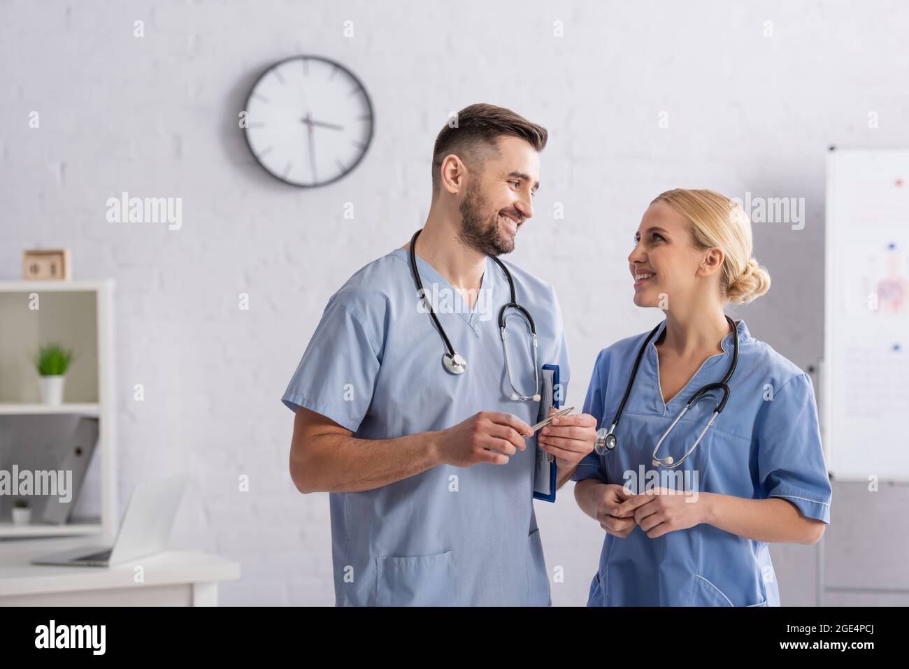 Positive woman doctors talking hi-res stock photography and images - Alamy
