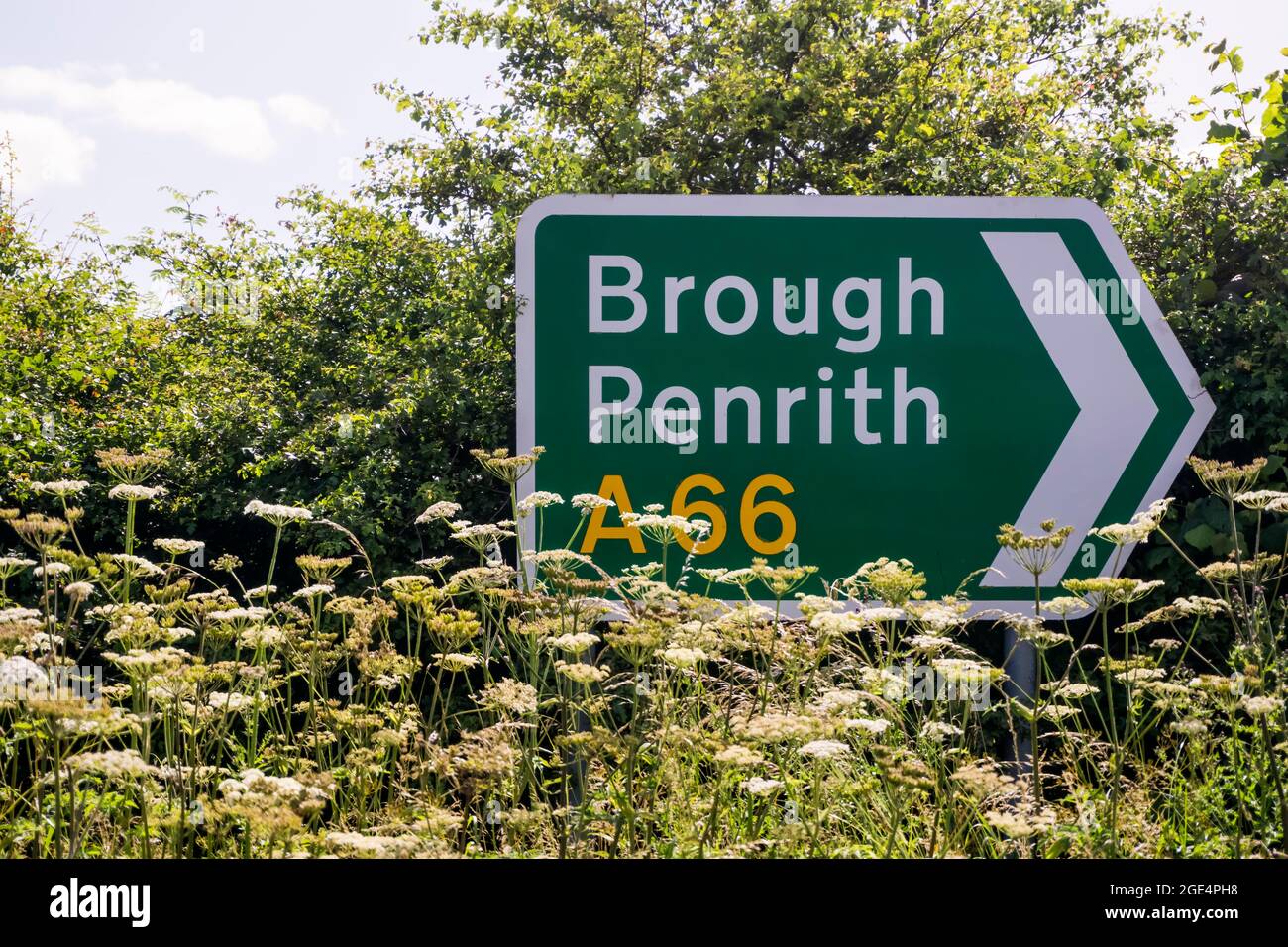 A road sign on the A66 road points west to Brough and Penrith Stock ...