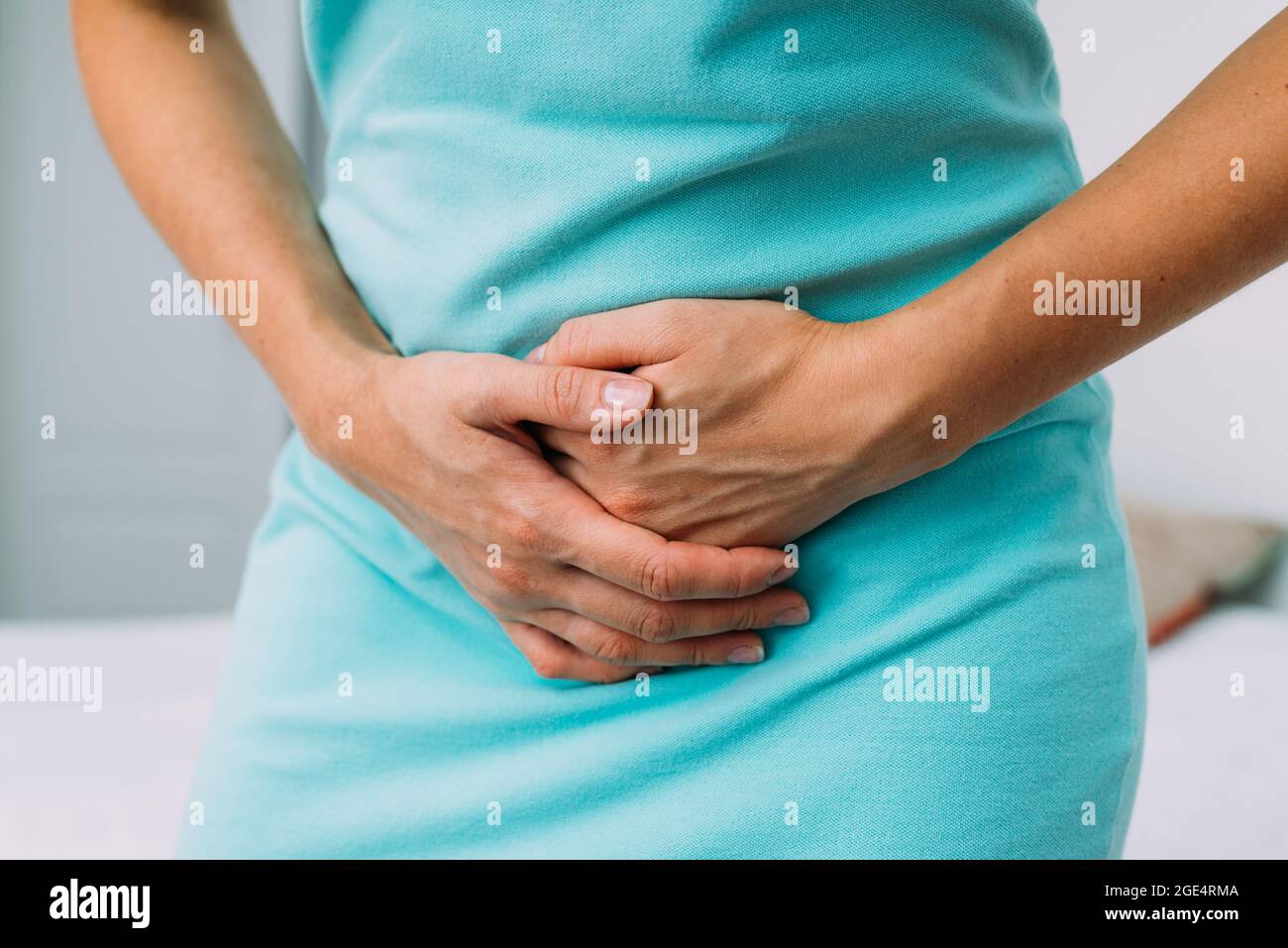 Woman experiencing pain in the lower abdomen from menstruation Stock ...