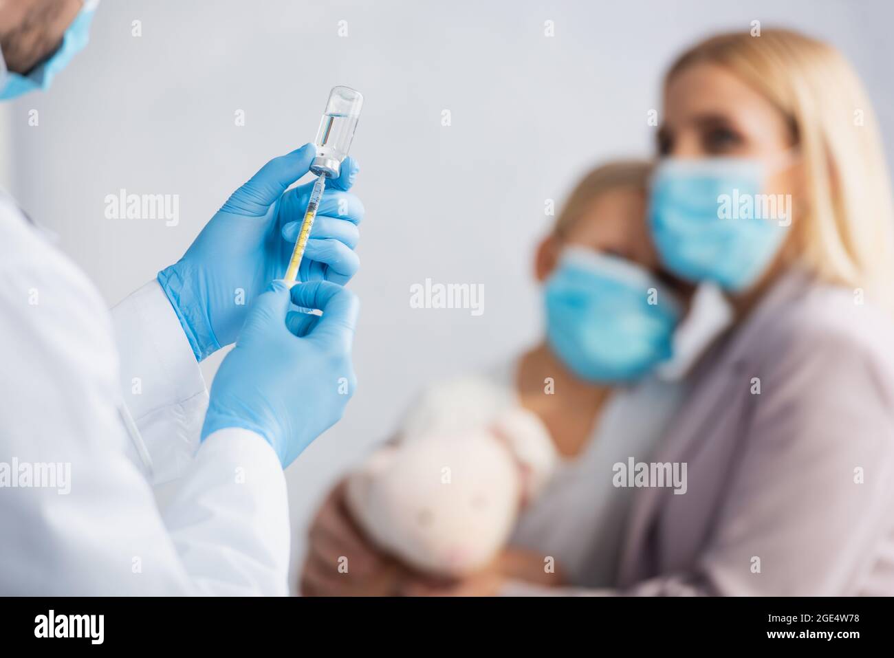 Girl picking up medication syringe hi-res stock photography and images ...