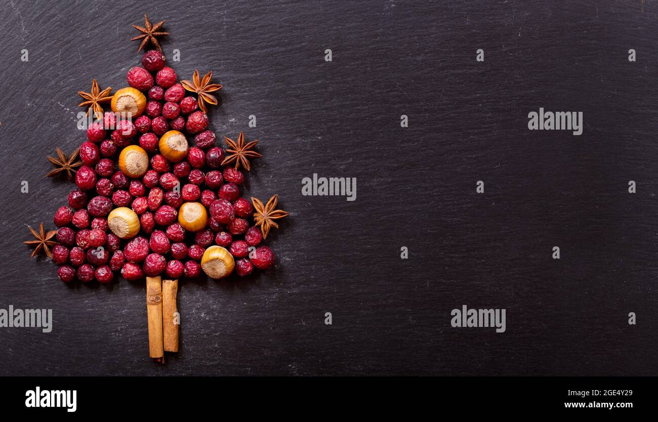 christmas tree made of dried cranberries, nuts, cinnamon sticks and and ...